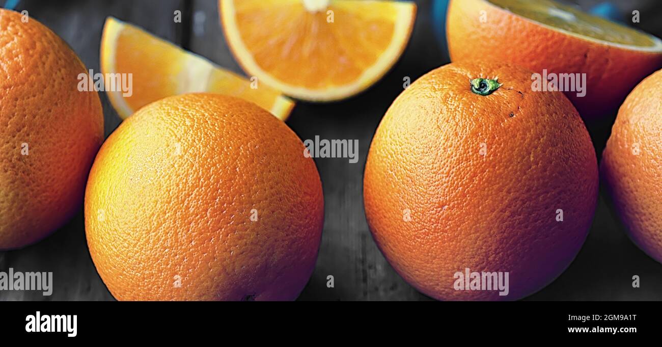 Orange citrus fruit on stone table. Orange background Stock Photo - Alamy