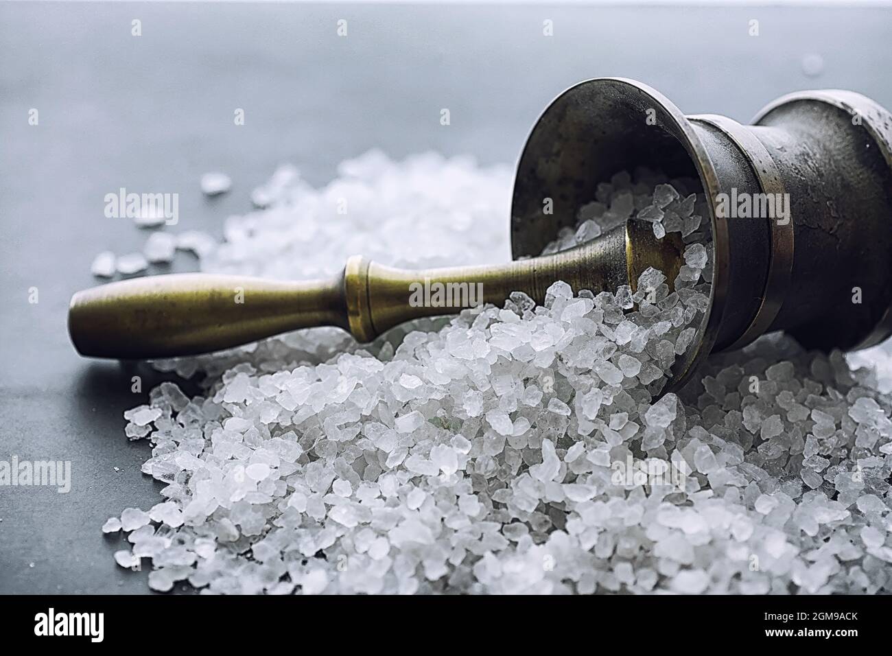 Large sea salt. Spice. Mortar and pestle for grinding salt Stock Photo ...