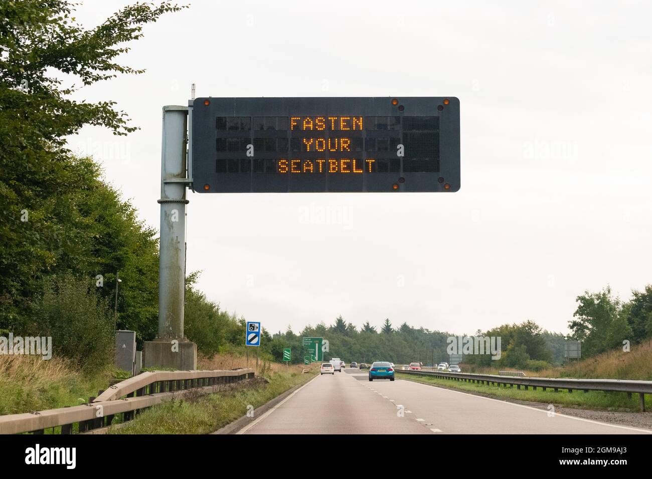 Fasten Your Seatbelt vms sign on A9 road Scotland, UK Stock Photo - Alamy