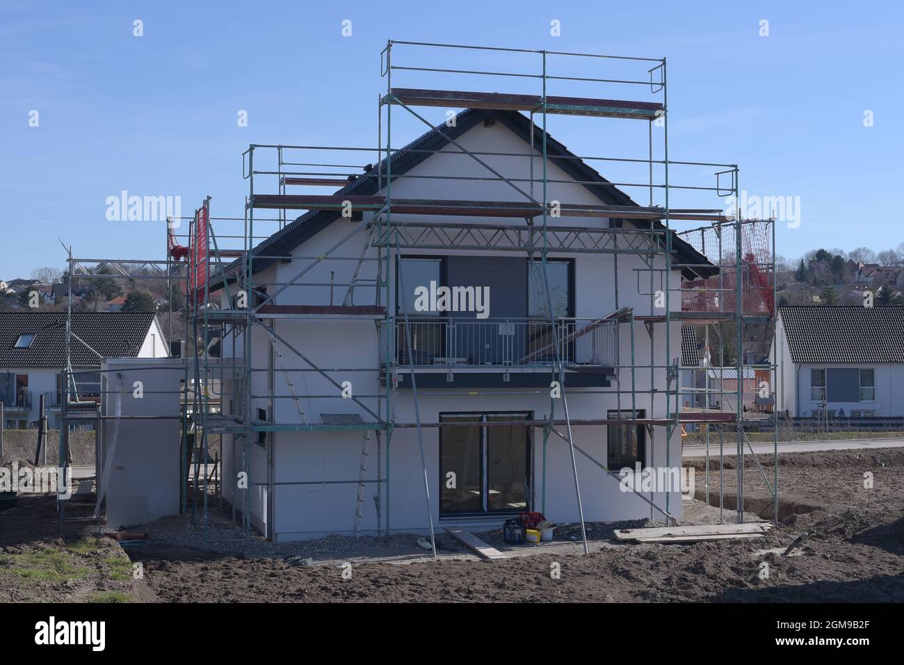 house under construction with scaffolding Stock Photo - Alamy