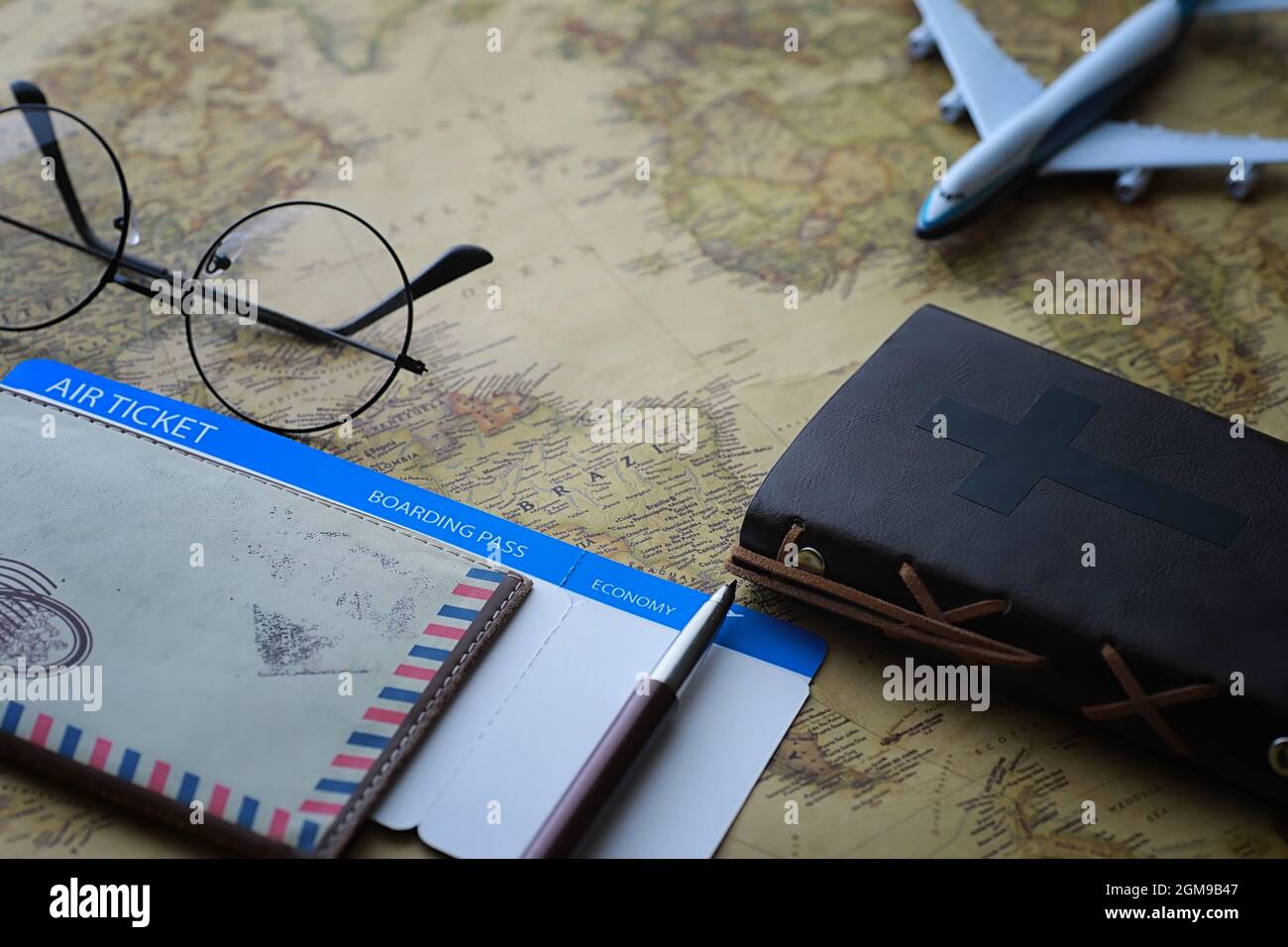 Travel concept. Map on the table and model aircraft Stock Photo - Alamy