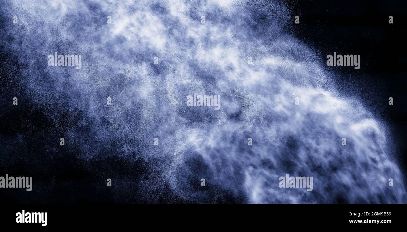 A stream of water and a cloud of drops from the atomizer Stock Photo ...