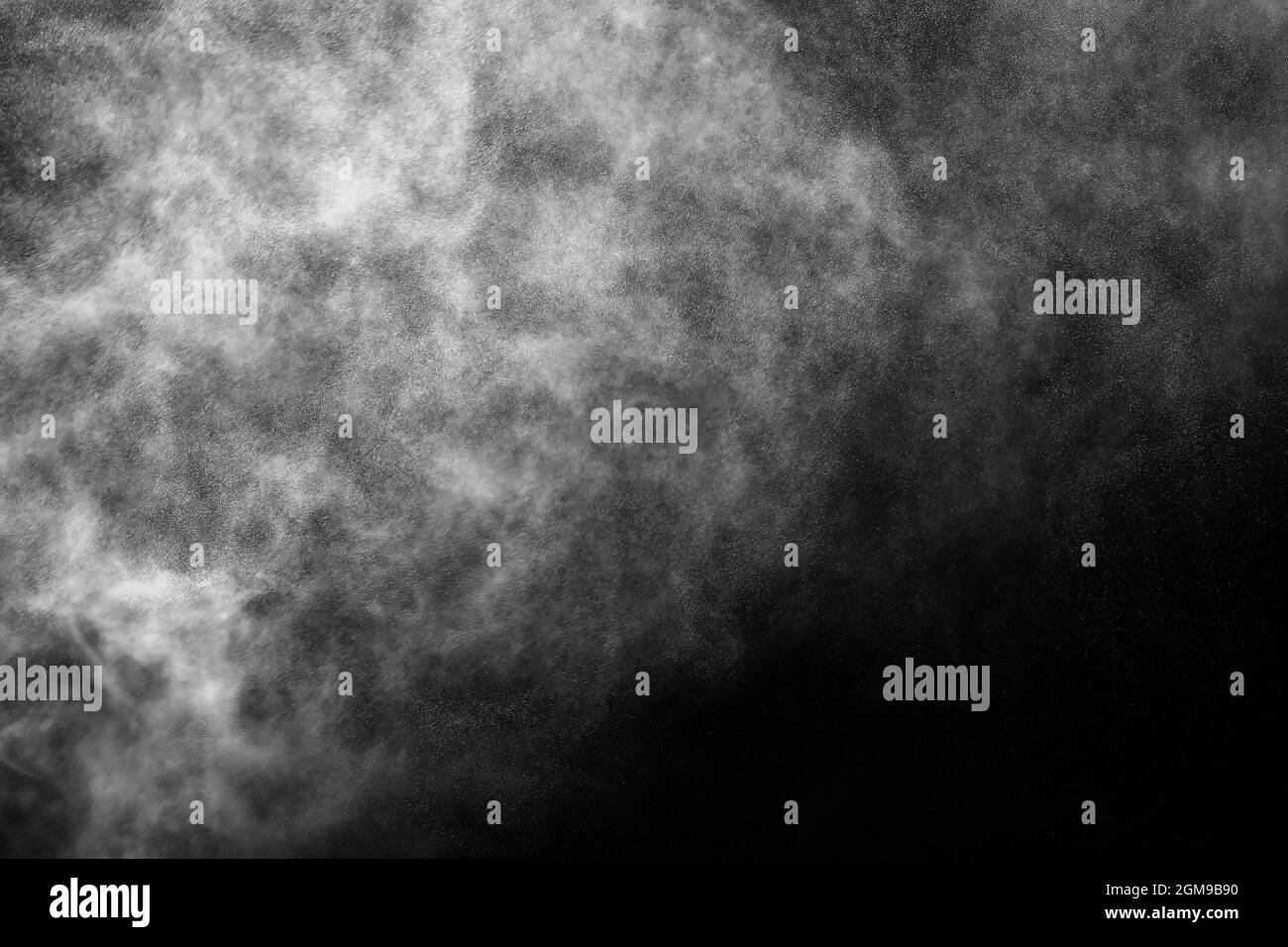 A stream of water and a cloud of drops from the atomizer Stock Photo ...