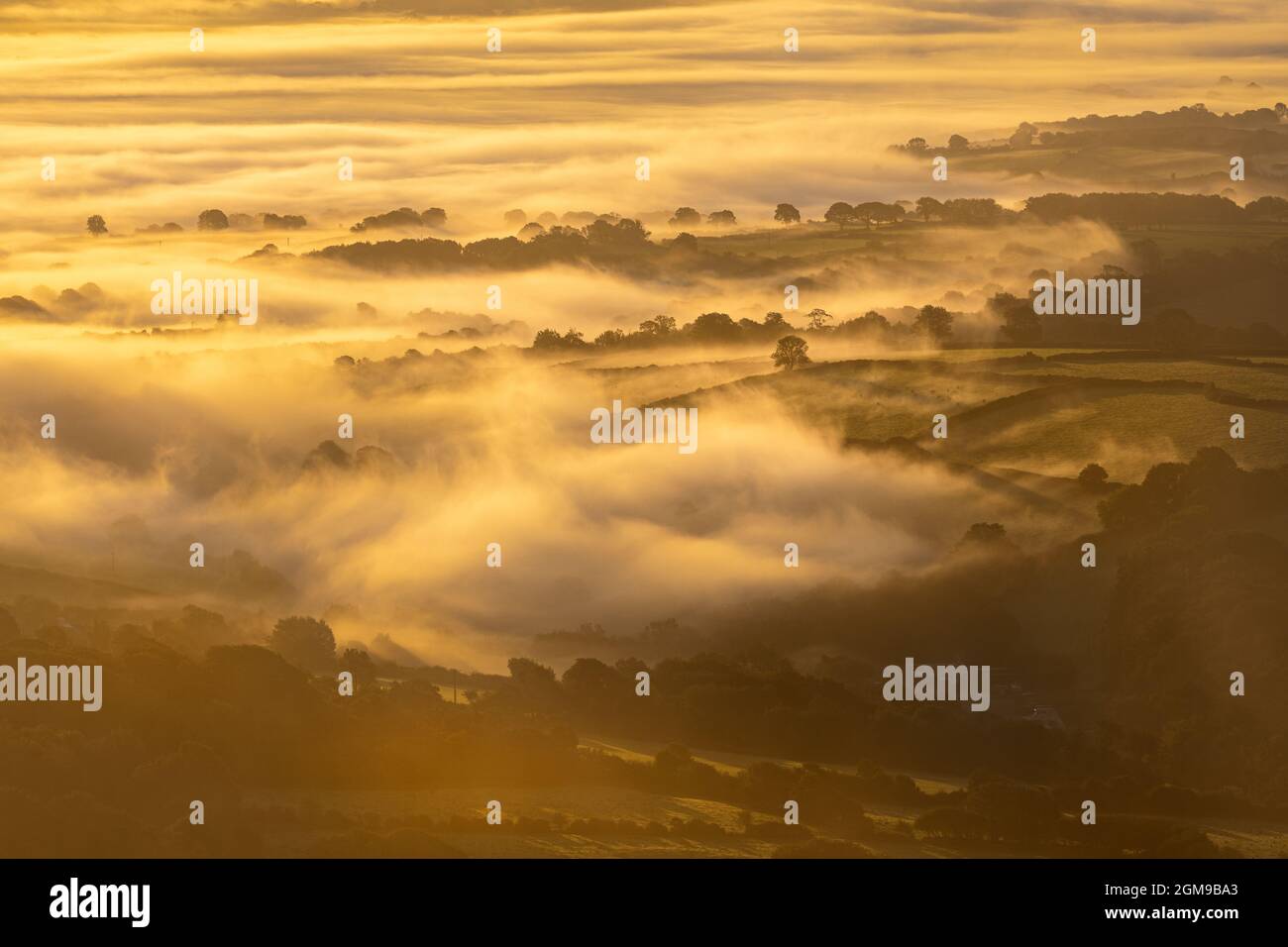 Cloud inversion in the Lyhner Valley from Sharp Tor Cornwall Stock ...