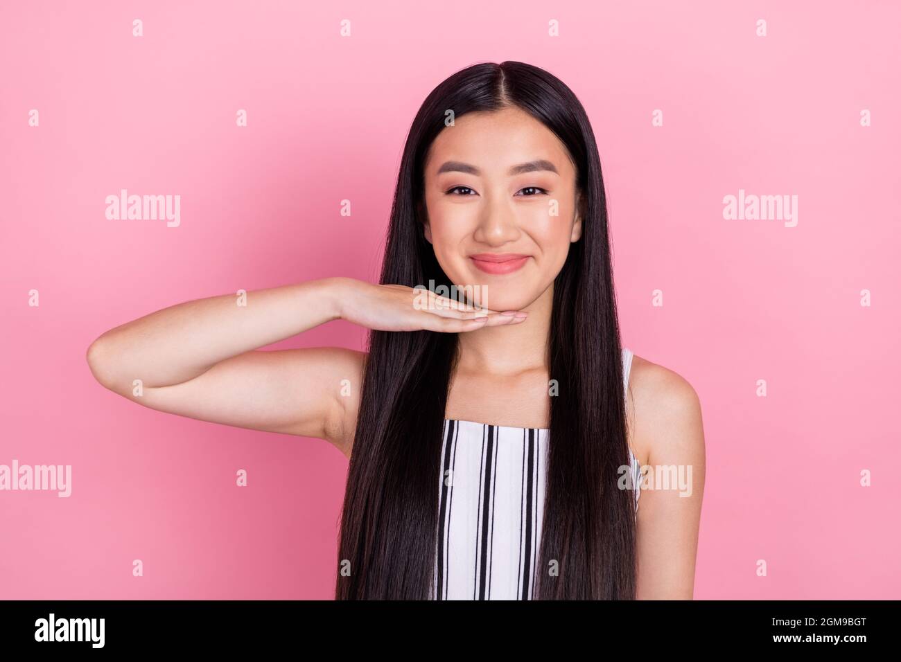 Photo of pretty shiny young lady wear striped outfit smiling arm chin ...