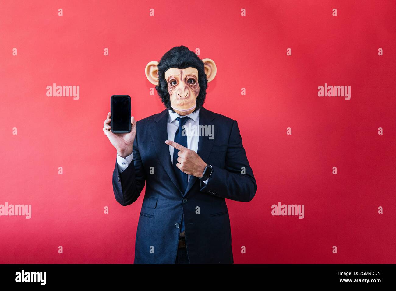 Wearing a monkey mask hi-res stock photography and images - Alamy