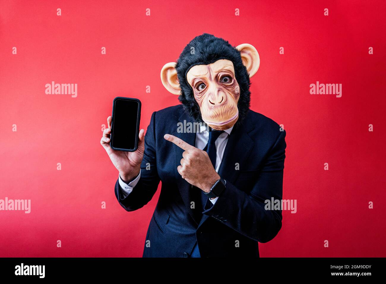 Wearing a monkey mask hi-res stock photography and images - Alamy