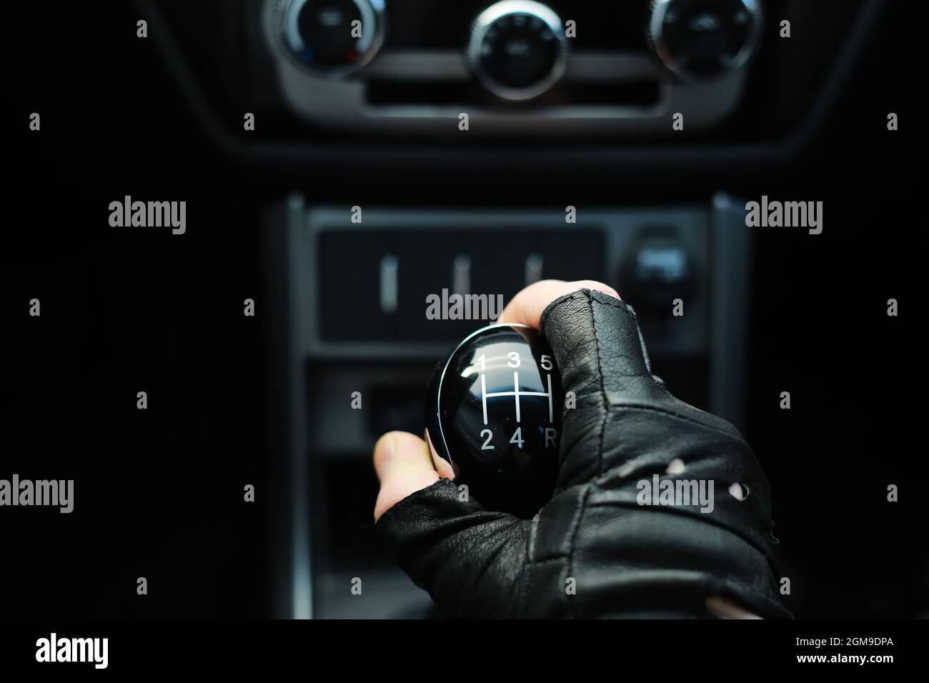 Gear lever. Manual Transmission. Hand on the gear shift in the car ...