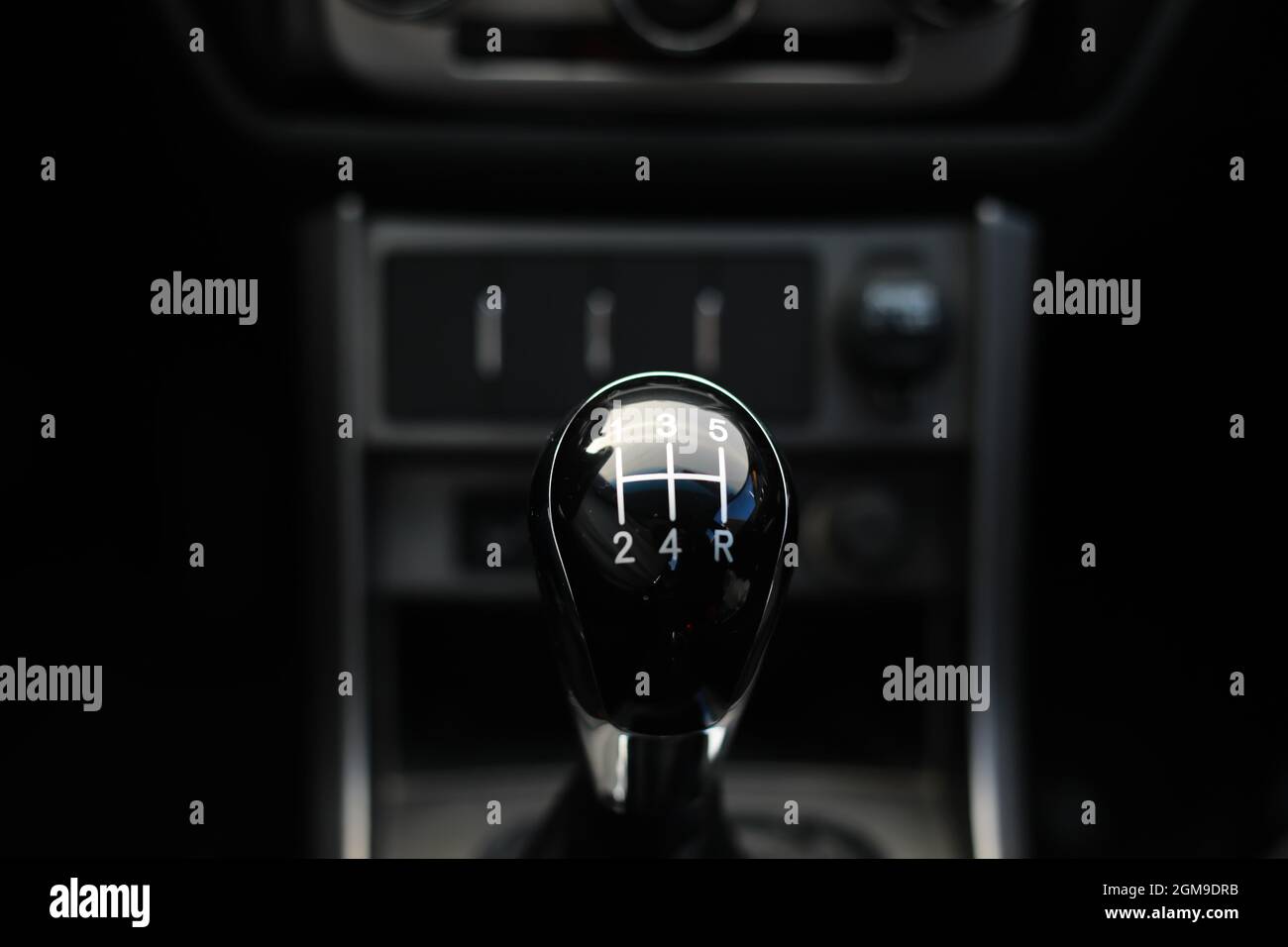 Gear lever. Manual Transmission. Hand on the gear shift in the car ...