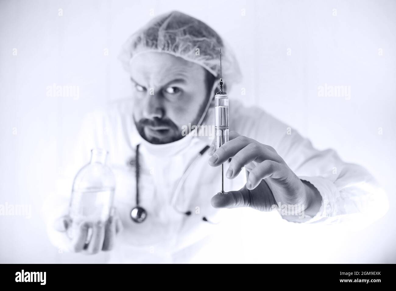 Black and white photo of bearded doctor in a white coat and an old ...