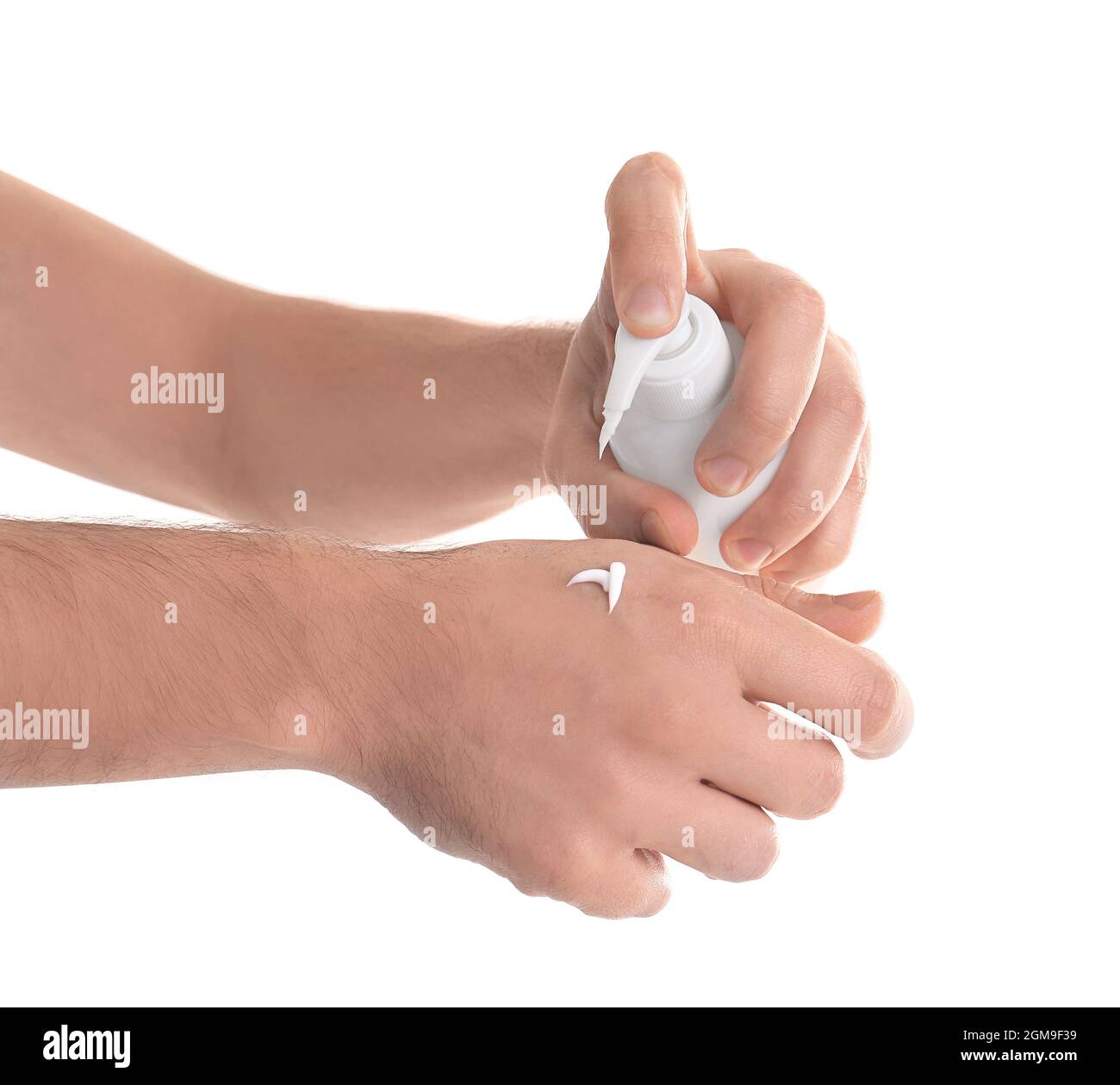 Man applying hand cream on white background Stock Photo - Alamy