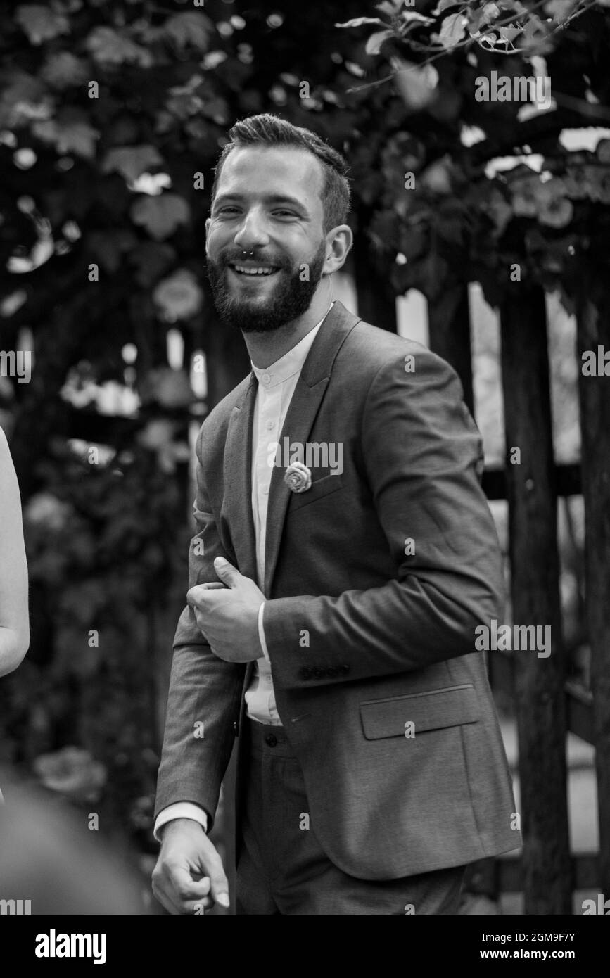 Grayscale man in the park Stock Photo - Alamy