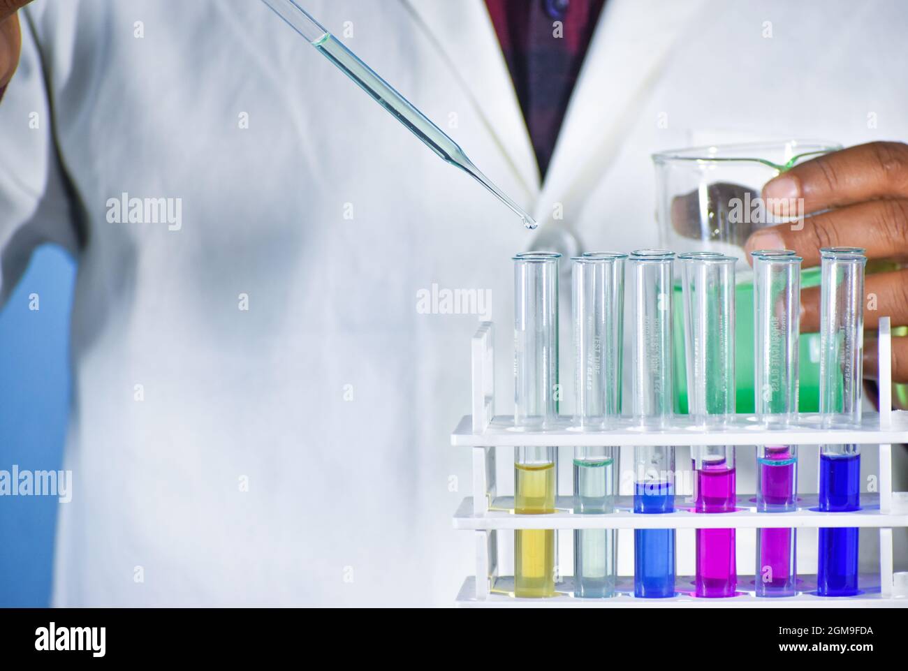 Test tubes blue liquid inside hi-res stock photography and images - Alamy
