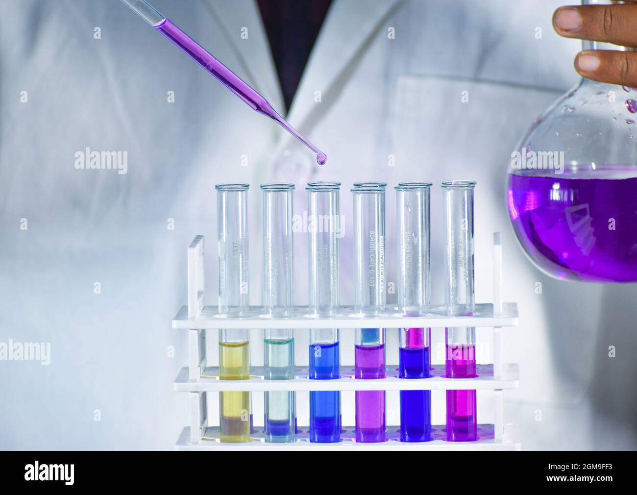 Test tubes blue liquid inside hi-res stock photography and images - Alamy