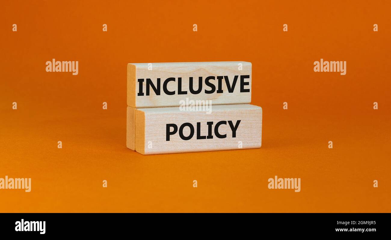Inclusive policy symbol. Wooden blocks with words Inclusive policy on ...
