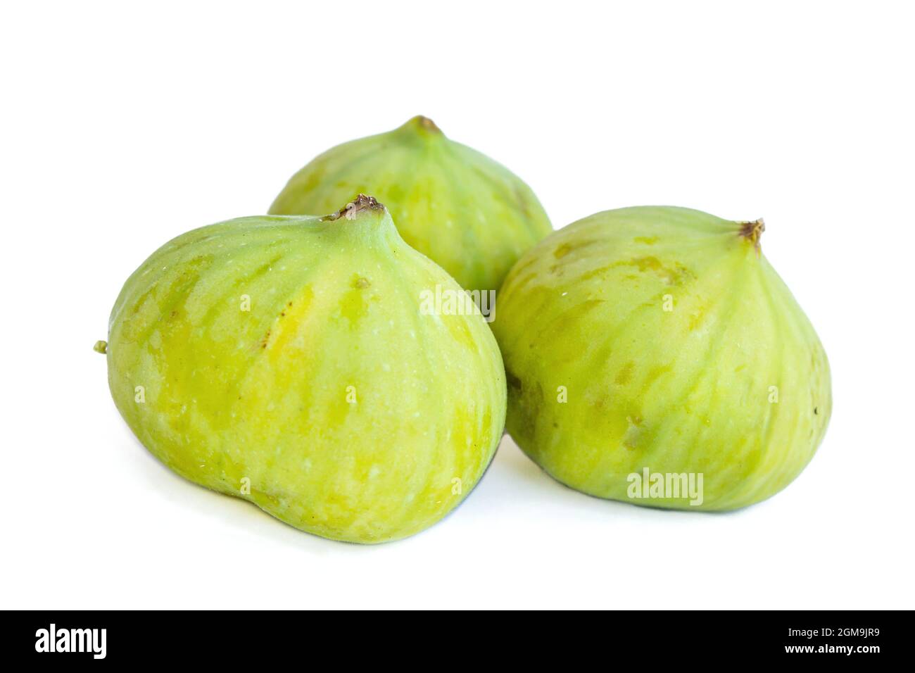 Green figs isolated on white background Stock Photo - Alamy