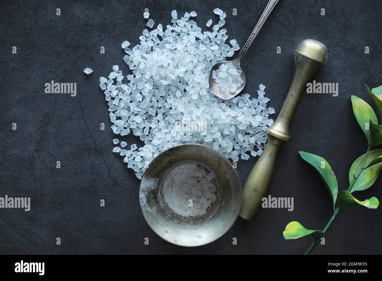 Large sea salt. Spice. Mortar and pestle for grinding salt Stock Photo ...