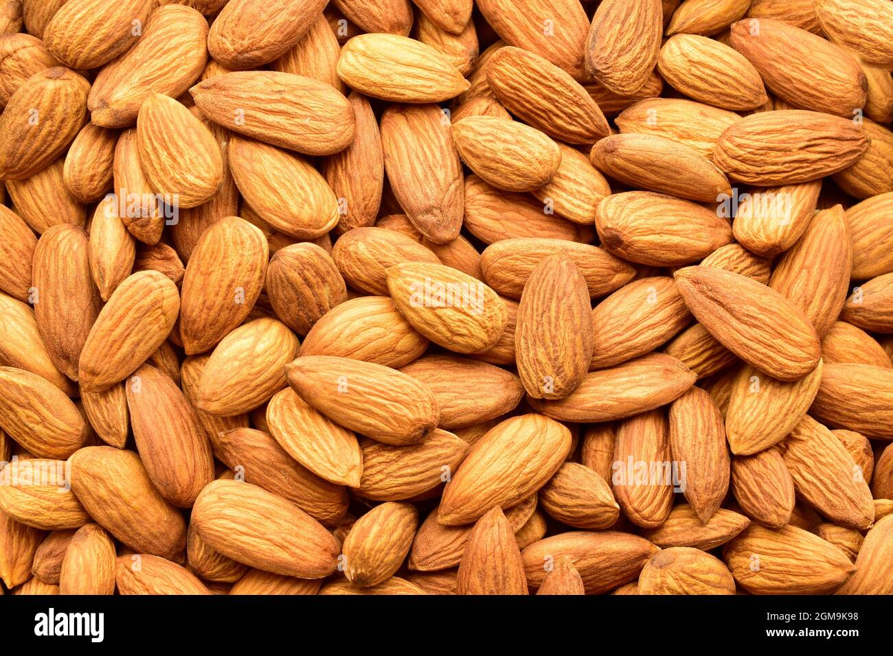 Almonds top view texture, background, dry fruit also called as badam ...