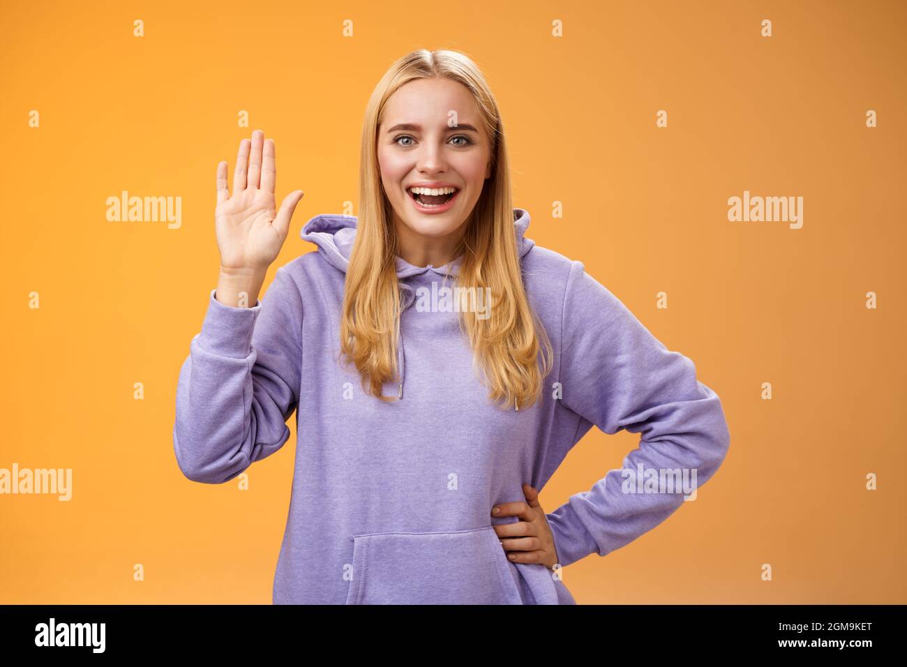 Friendly energized helpful charming female student say hello newcomers ...