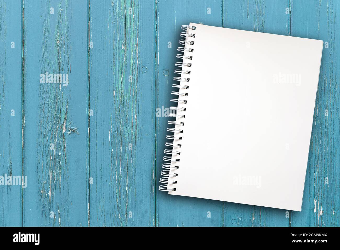 blank spiral notepad with copy space on rustic wooden table Stock Photo ...