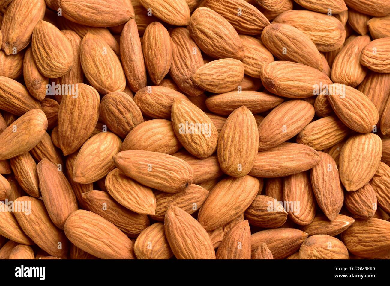 Almonds top view for background, top view of almond texture Stock Photo ...