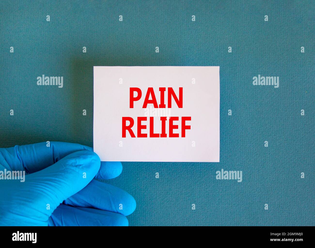 Pain relief symbol. White note with words Pain relief, beautiful blue ...