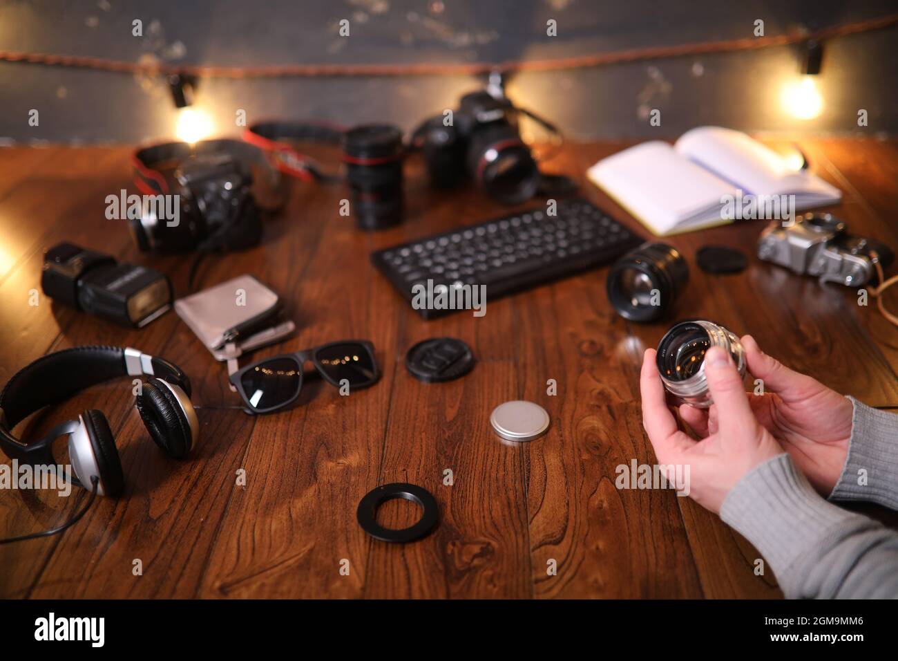 Desk photographer laptop cameras hi-res stock photography and images ...