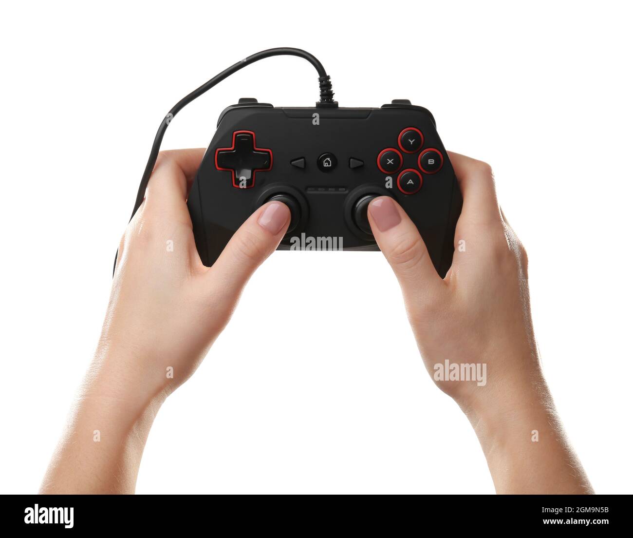 Woman holding video game controller on white background Stock Photo - Alamy