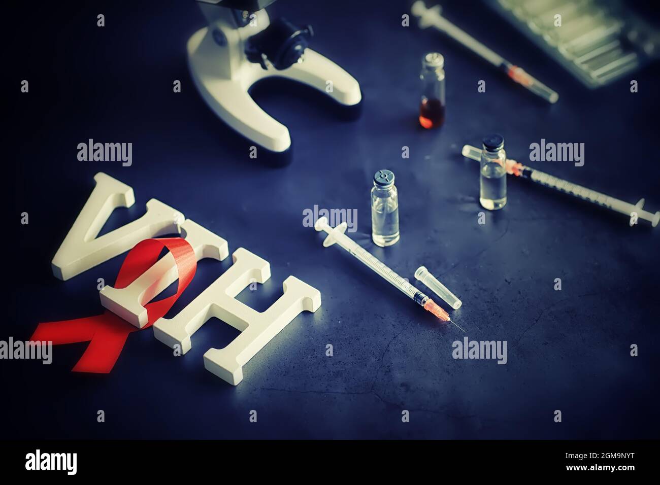 Symbol of human immunodeficiency virus disease. Red ribbon. A helping ...