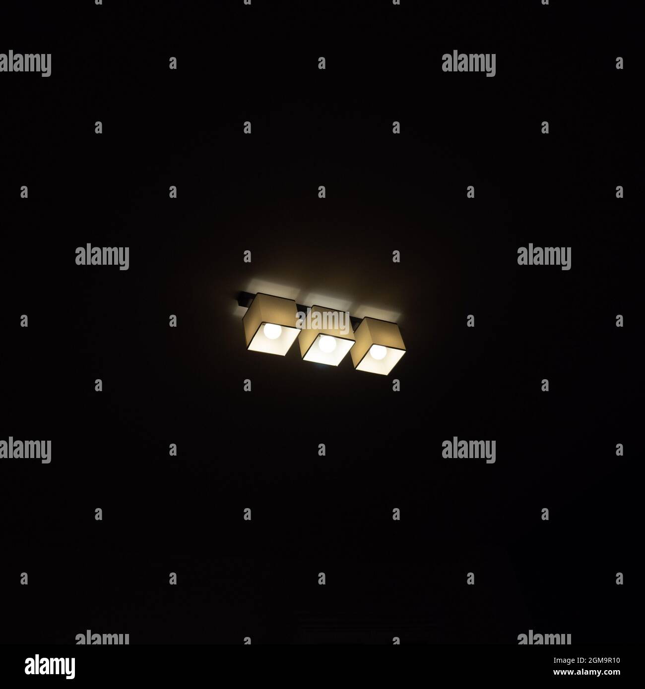 three lights in totally black abstract conceptual photo Stock Photo - Alamy