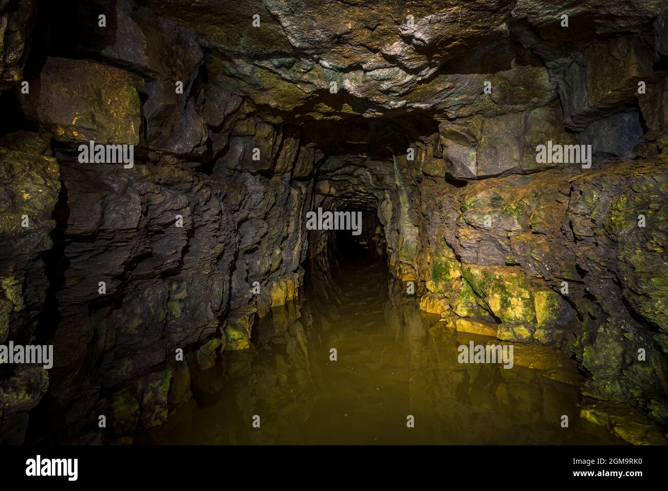An old abandoned mining facility an ore mine tunnel system underground ...
