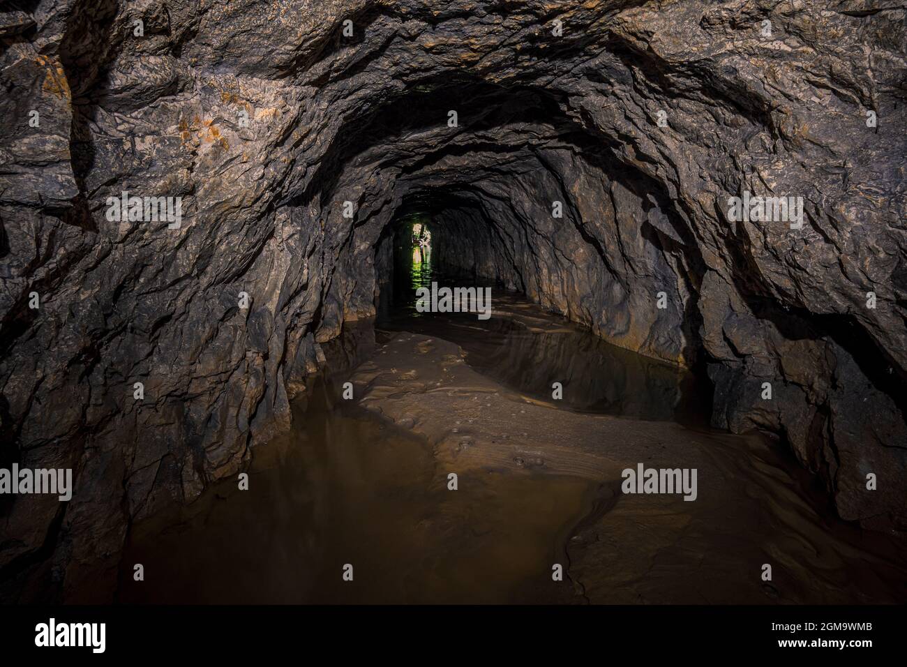 An old abandoned mining facility an ore mine tunnel system underground ...