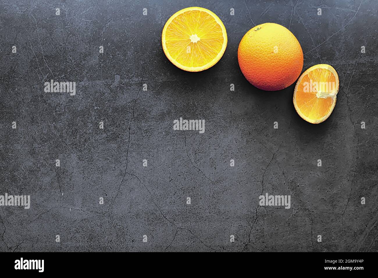 Orange citrus fruit on stone table. Orange background Stock Photo - Alamy