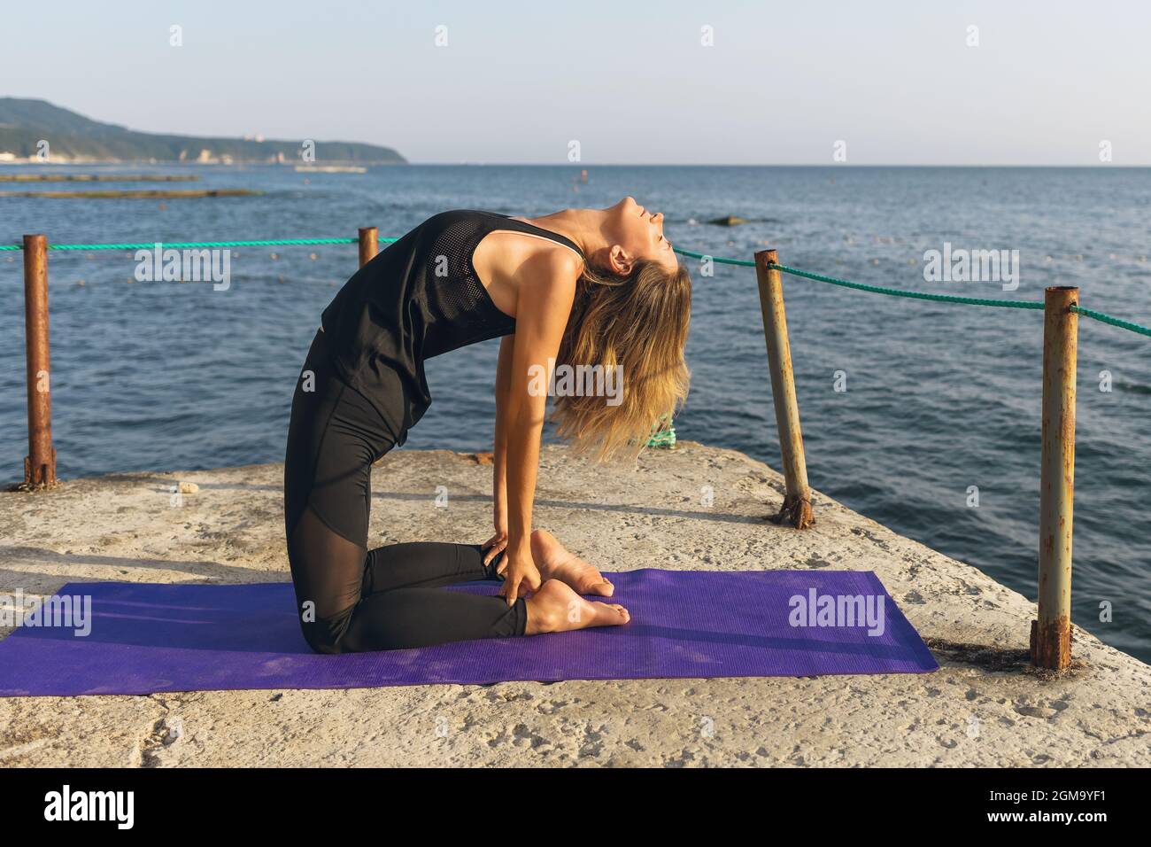 Camel pose yoga hi-res stock photography and images - Alamy