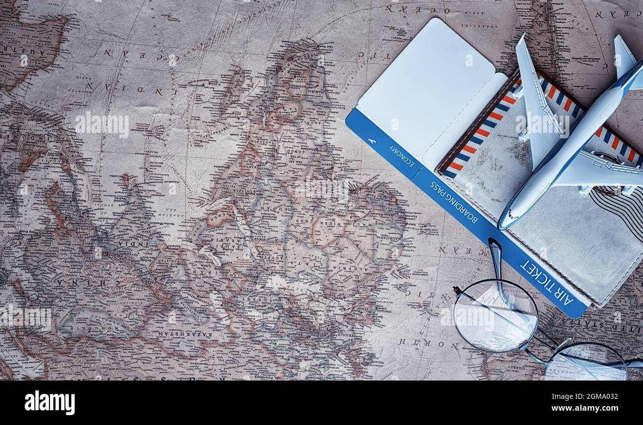 Travel concept. Map on the table and model aircraft Stock Photo - Alamy