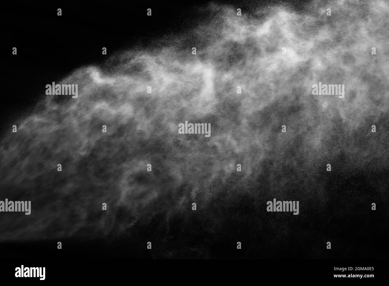 A stream of water and a cloud of drops from the atomizer Stock Photo ...
