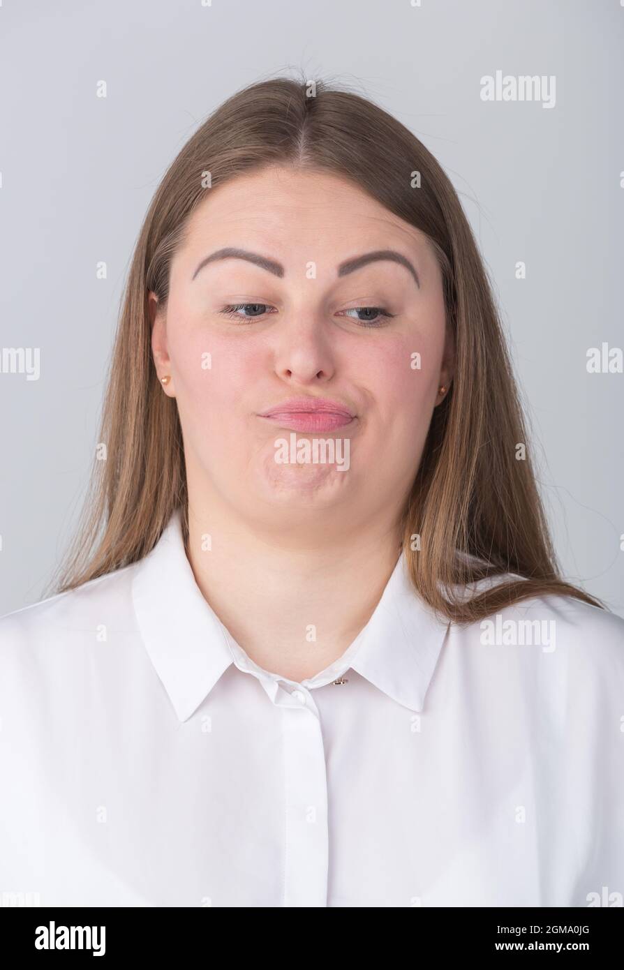 Discontented overweight woman portrait. Unsatisfied emotion. Displeased ...