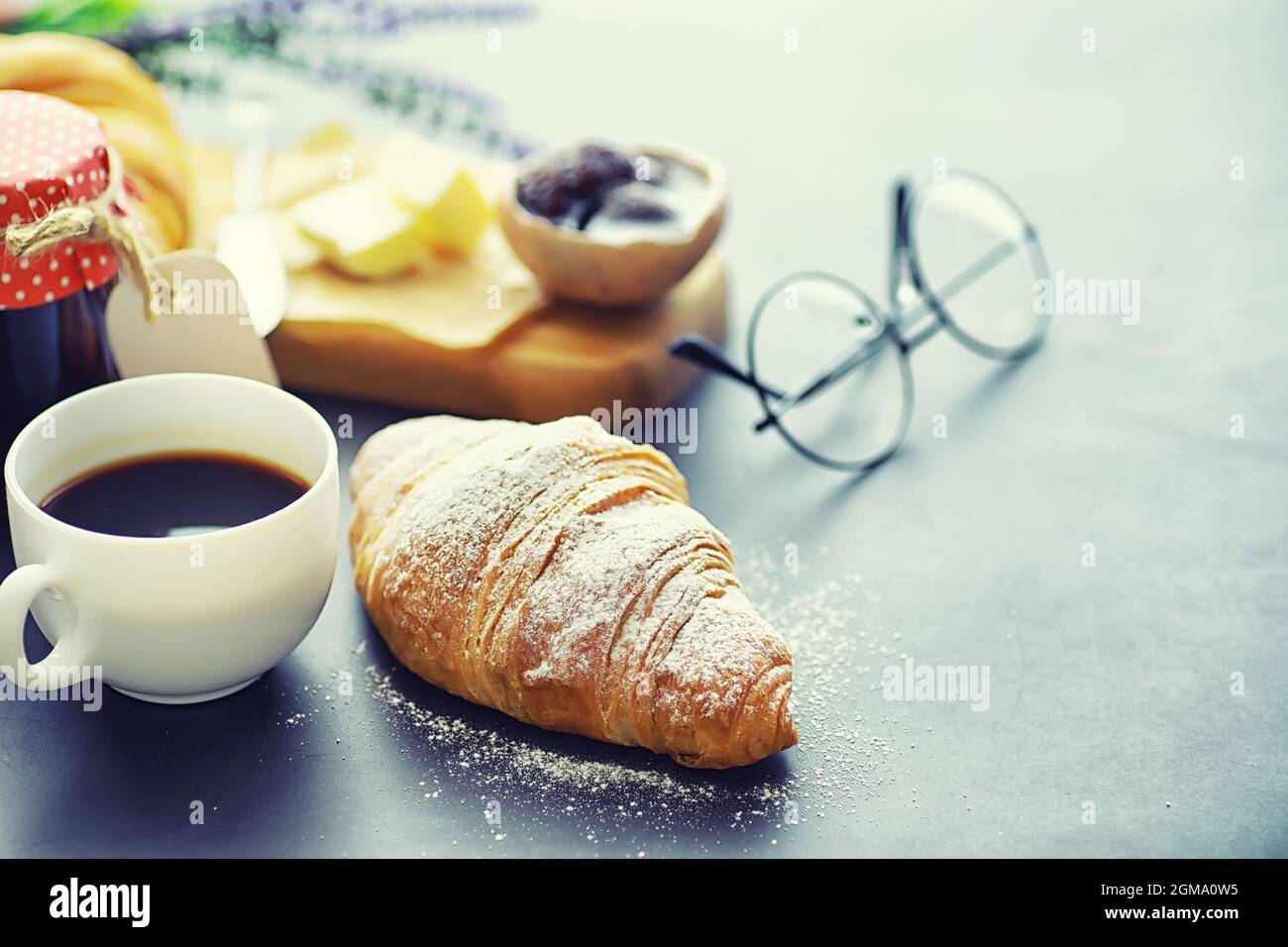 Fresh pastries on the table. French flavored croissant for breakfast ...