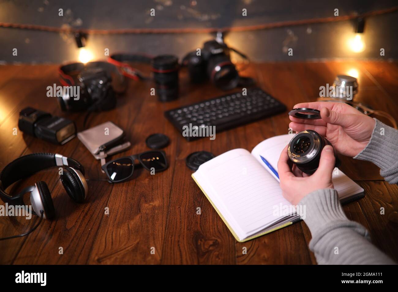 Desk photographer laptop cameras hi-res stock photography and images ...