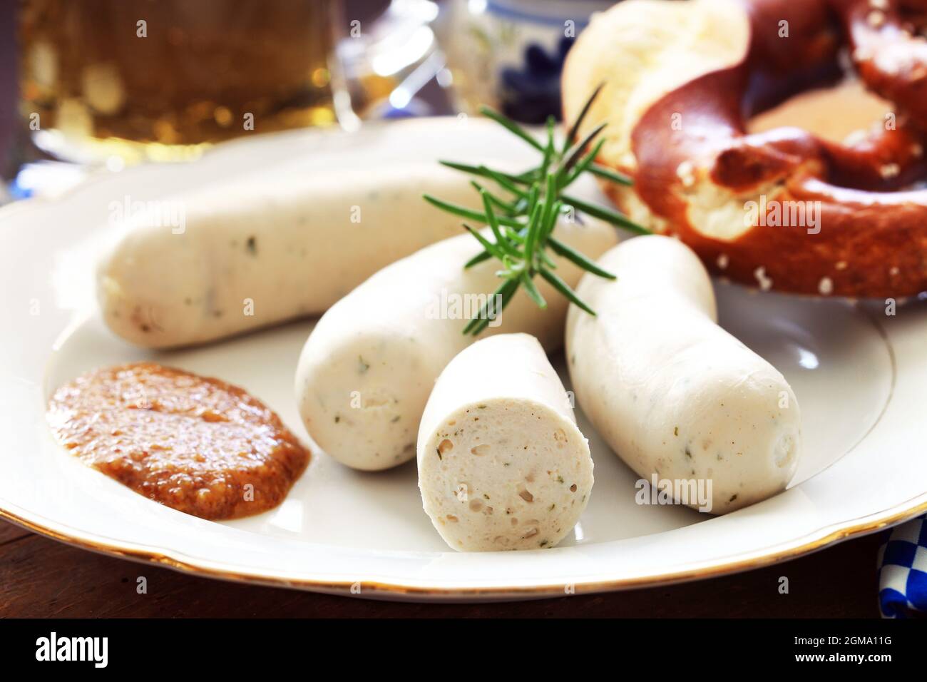 Bavarian snack with weisswurst white sausage hi-res stock photography ...