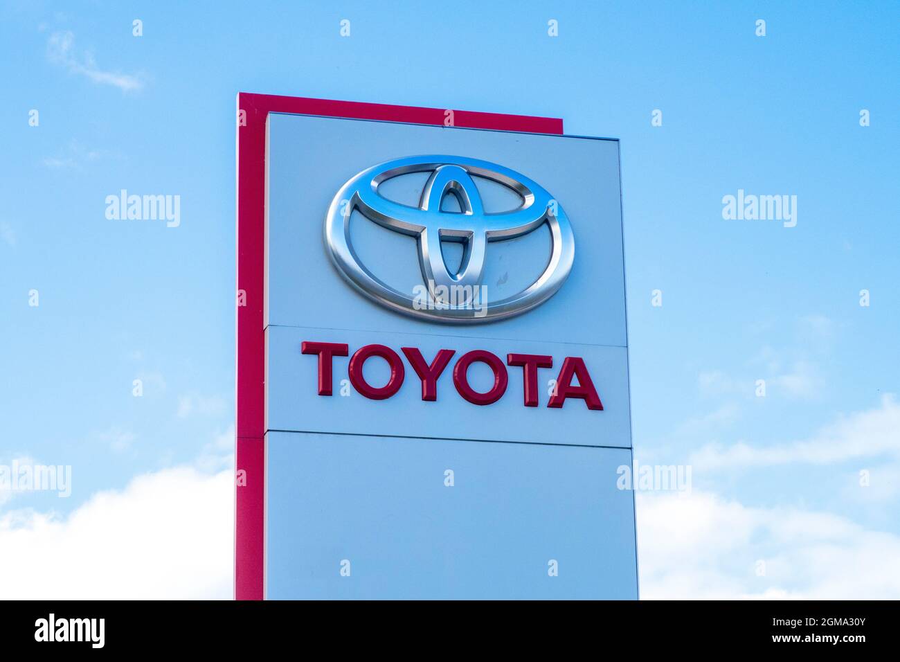 Toyota car logo and sign outside car dealer showroom, Exeter Stock ...