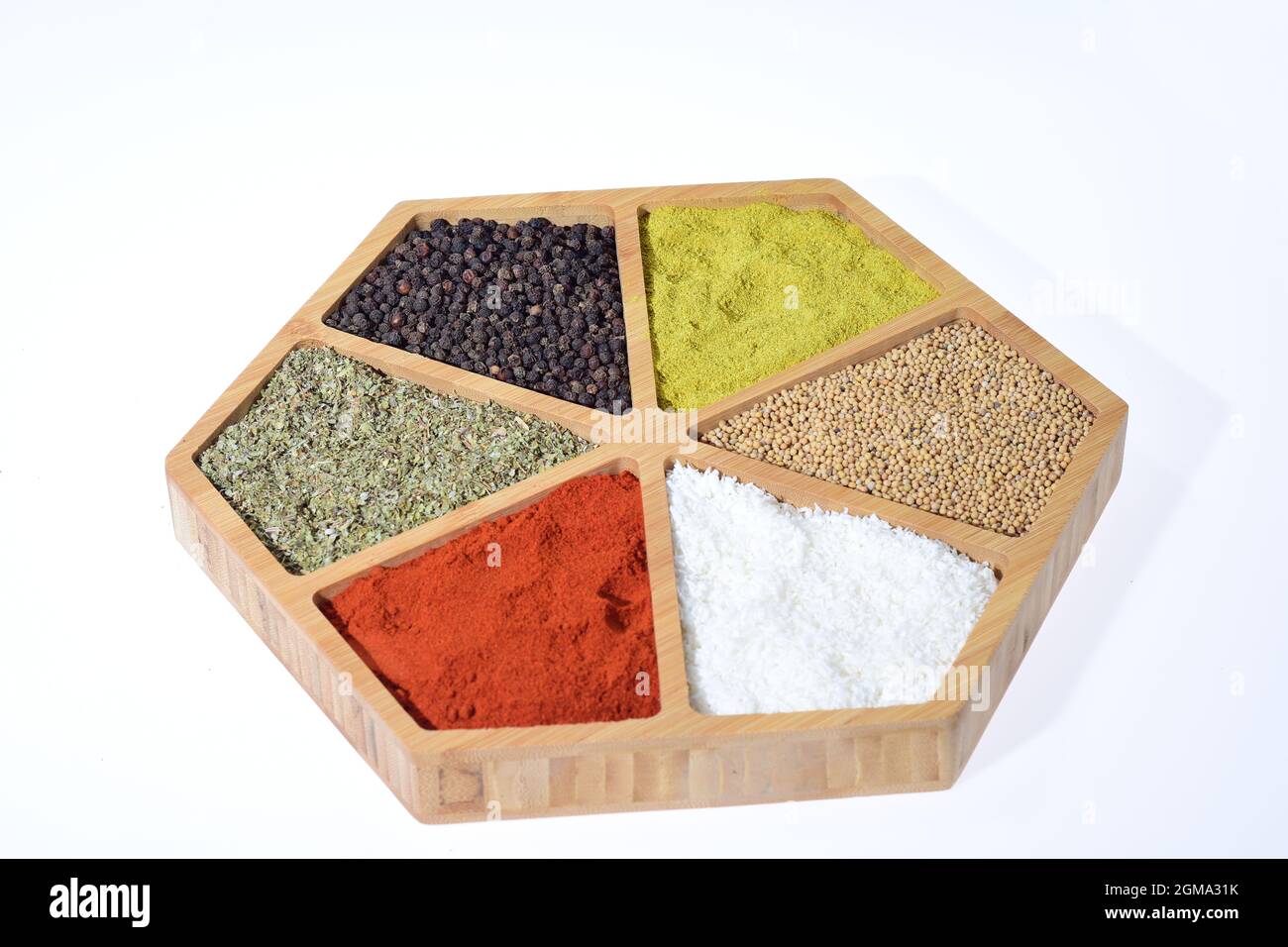 Colorful mix of spices in a wooden container. Food. Oriental spices ...