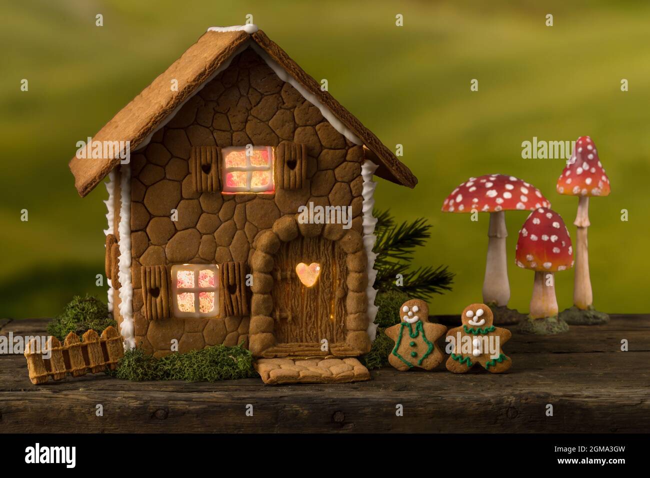Cute little edible gingerbread cookie house with toadstools Stock Photo ...