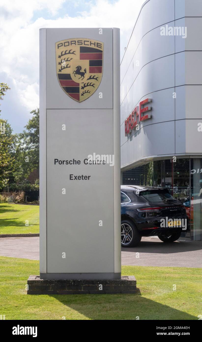 Porsche car dealership.Porsche logo and sign outside car dealer ...