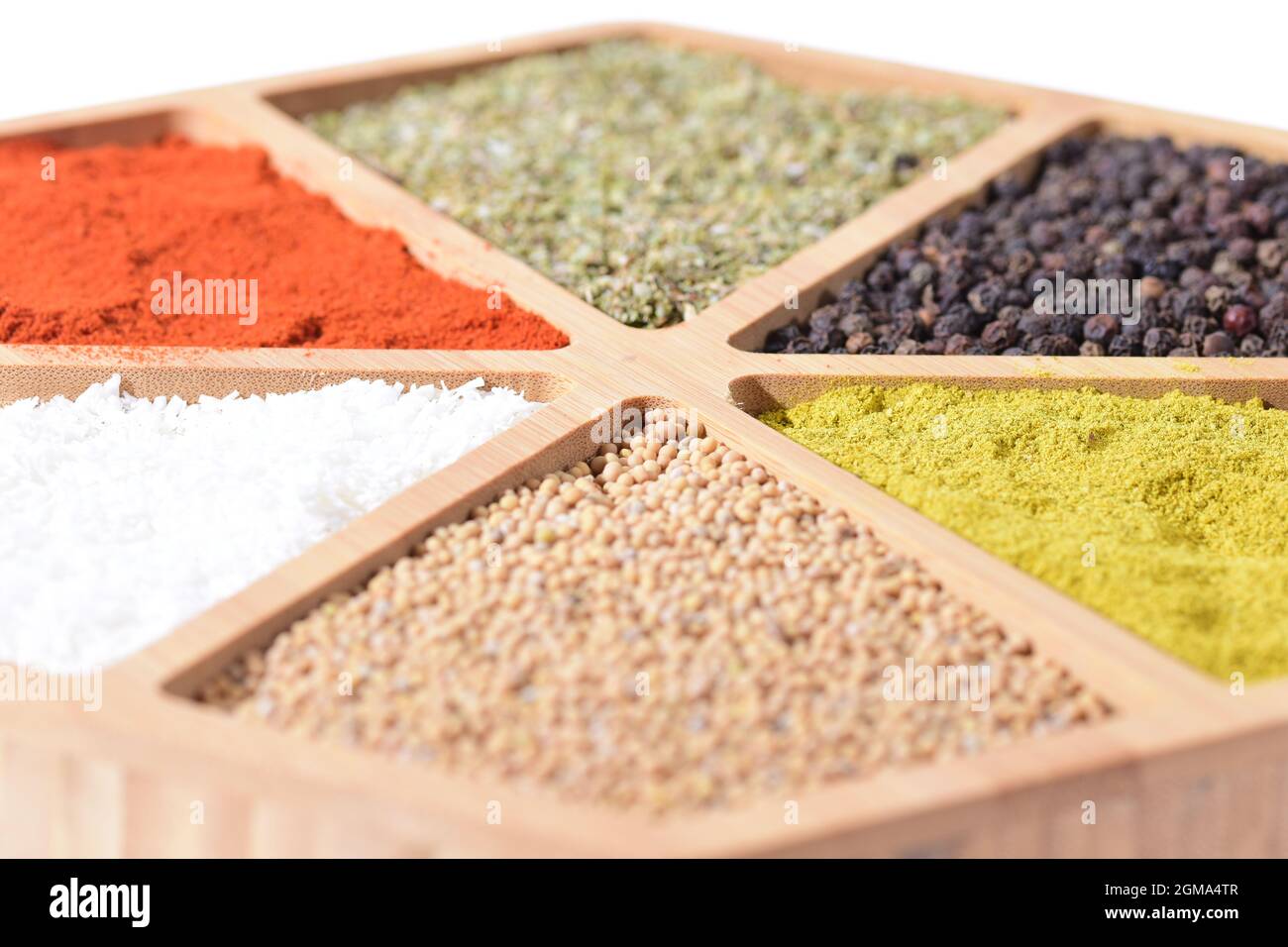 Colorful mix of spices in a wooden container. Food. Oriental spices ...