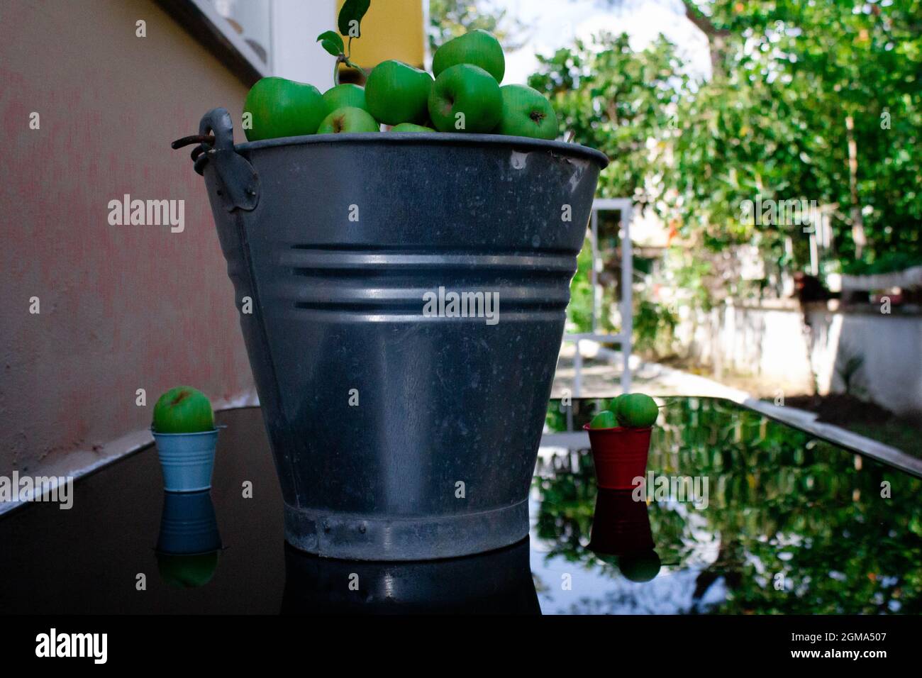 apples in buckets. people's share is related with their effort. effort ...