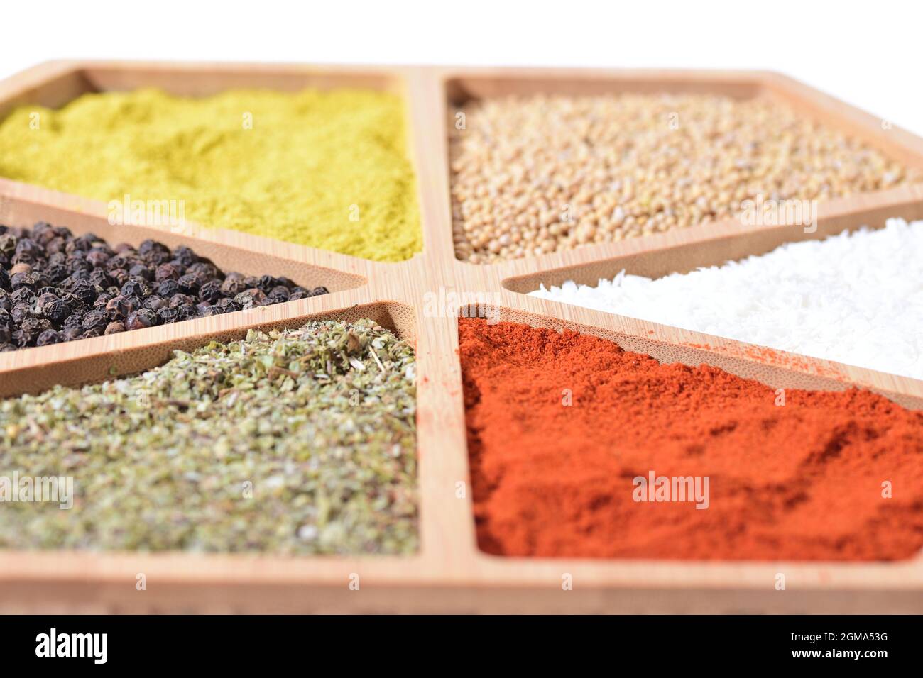 Colorful mix of spices in a wooden container. Food. Oriental spices ...