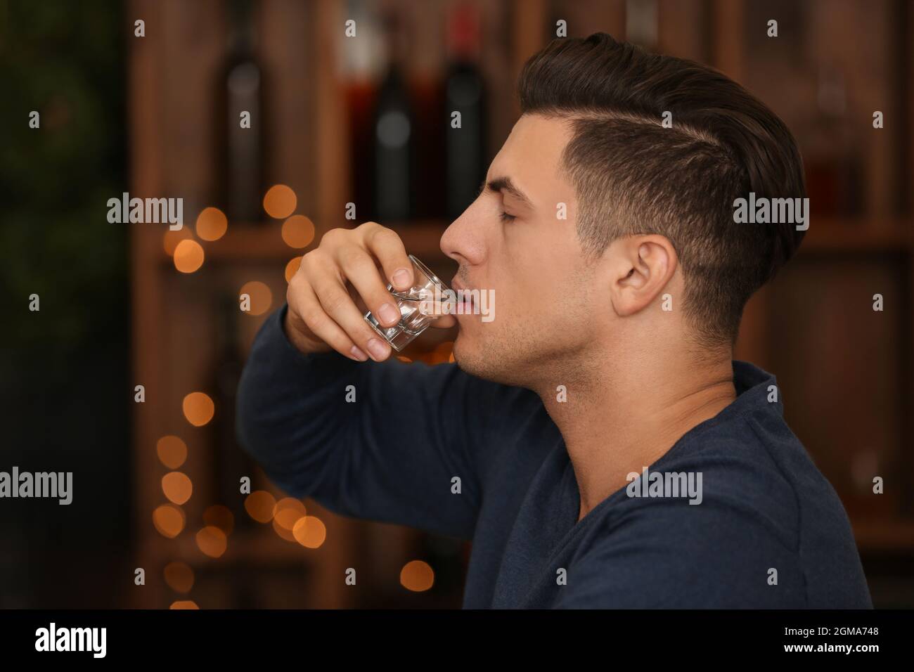 Sad man drinking vodka hi-res stock photography and images - Alamy