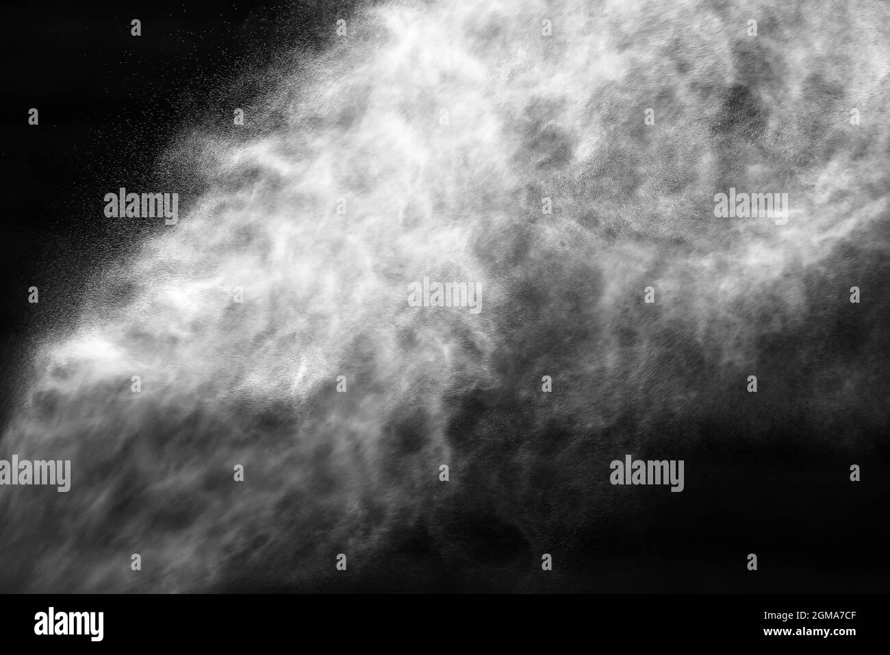 A stream of water and a cloud of drops from the atomizer Stock Photo ...