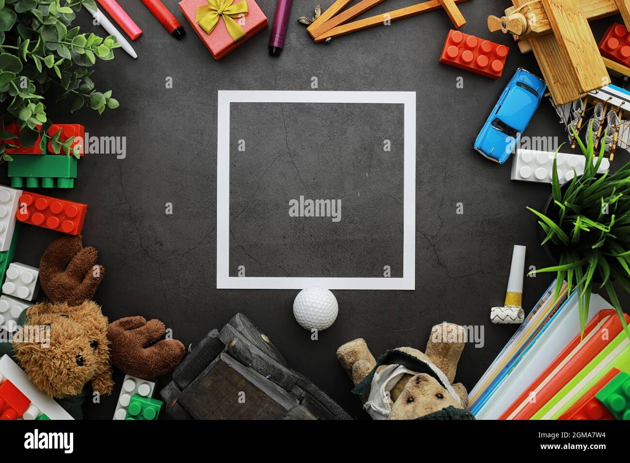 Background. Children's toys on the table. The space between kid's toys ...